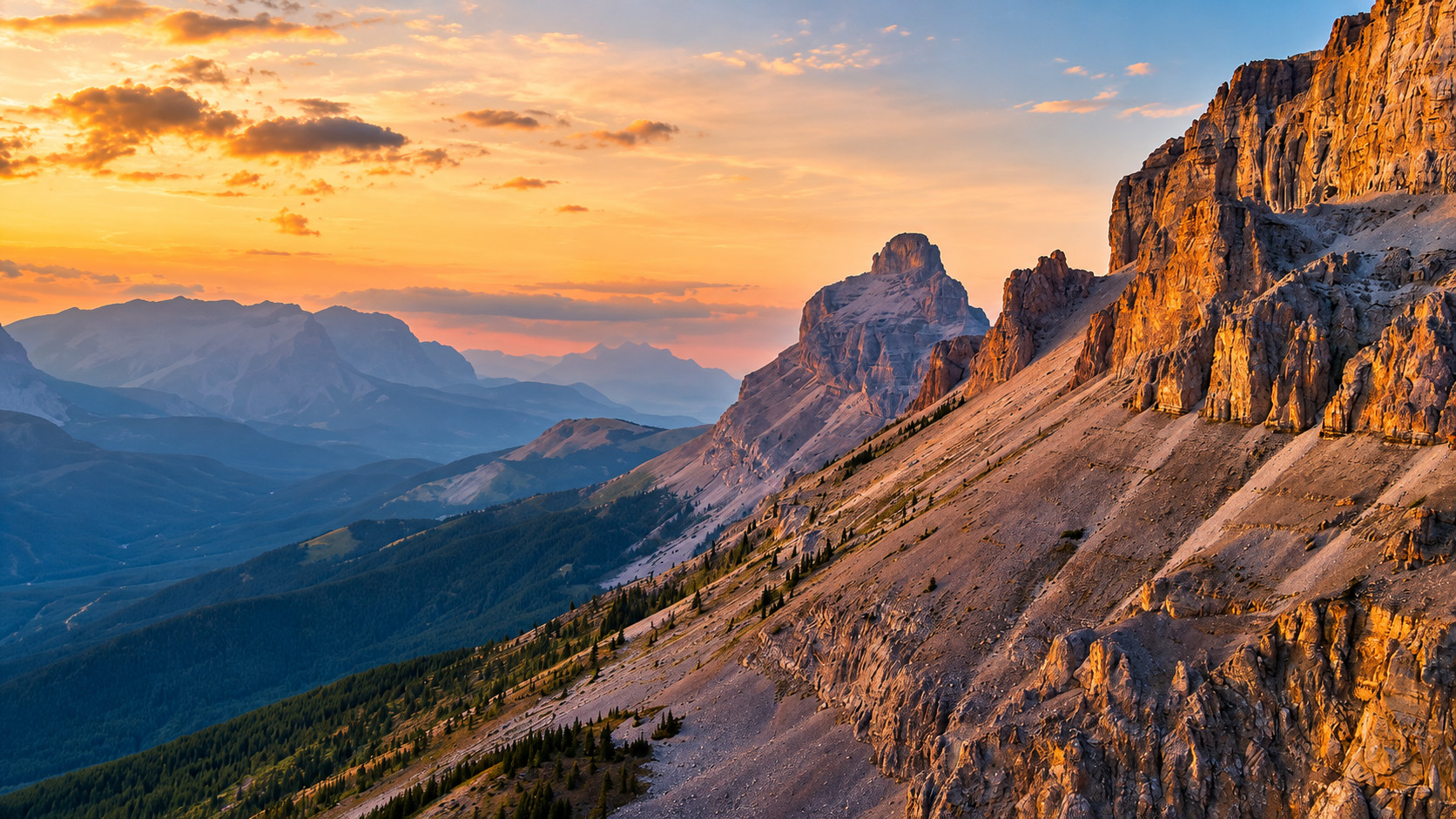 Crowsnest Pass glowing between Alberta’s mountain peaks