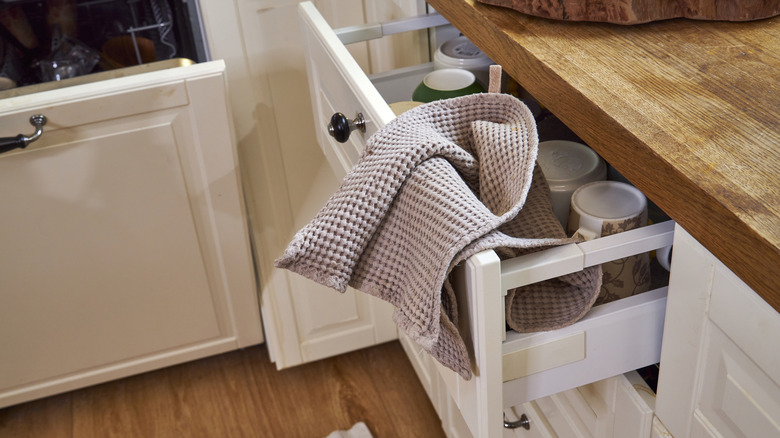 Ditch crammed kitchen drawers: Here's a smarter way to fold and store ...