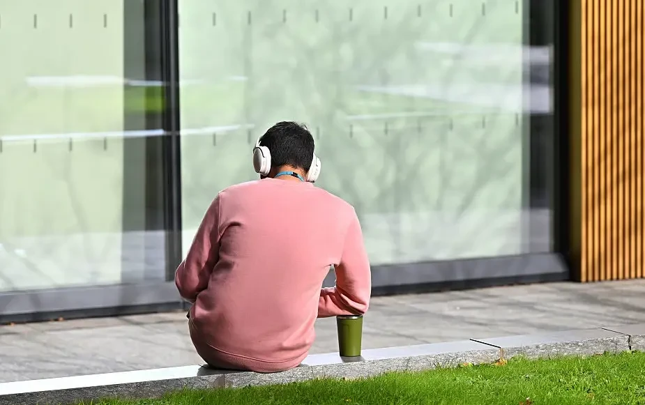 Experts link constant audio use to lost focus and social disconnection