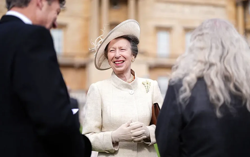 Princess Anne breaks protocol to warmly greet portrait artist