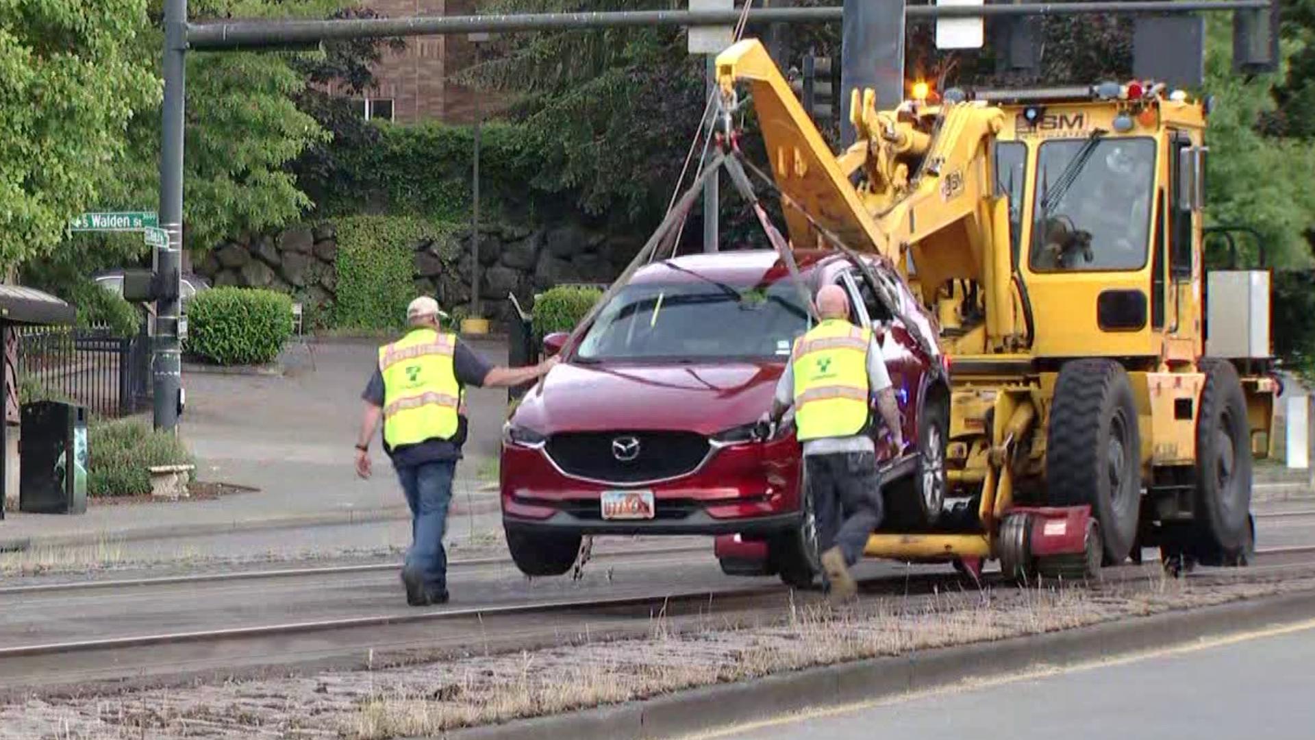 Car removed from elevated light rail tracks in Seattle