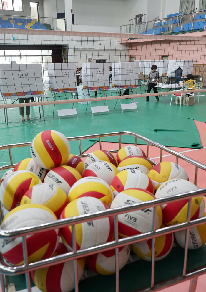 Polling station at volleyball stadium