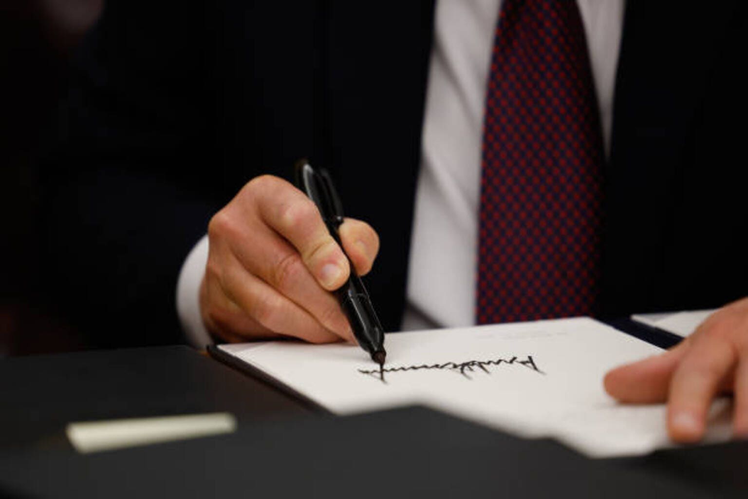 Trump inks executive order for vetting advanced AI models