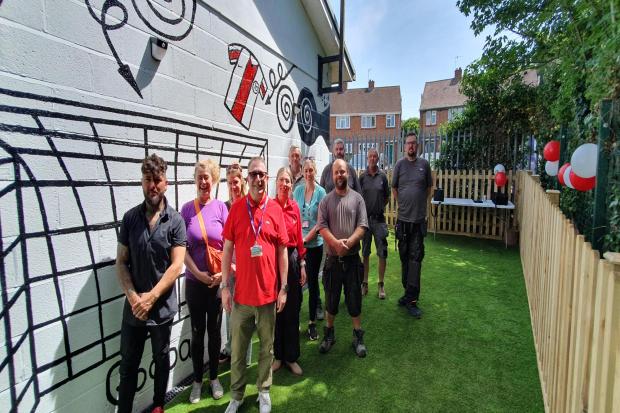 Muddy and flooded play area transformed into safe space for children