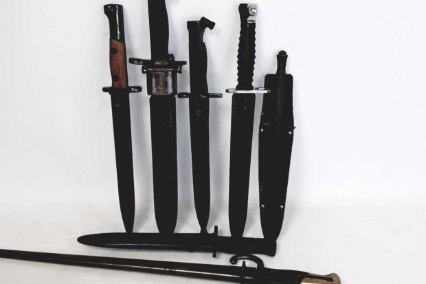 Armed cops swarmed flat after bayonet used in e-bike robbery