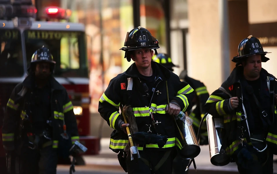 Firefighters cut into 22nd-floor window to rescue stranded crew