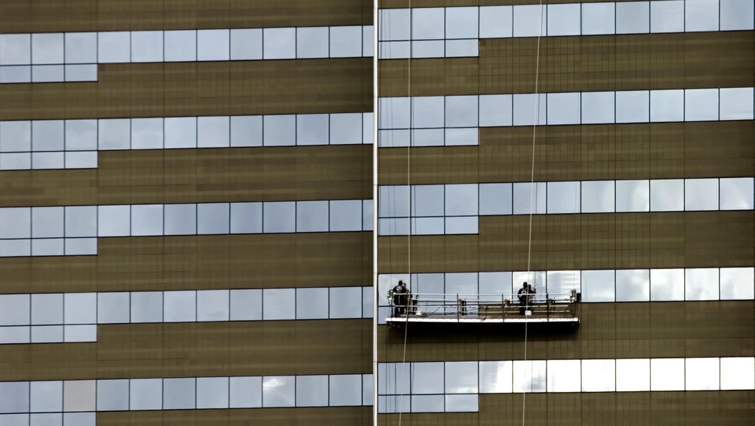 Firefighters cut into 22nd-floor window to rescue stranded crew