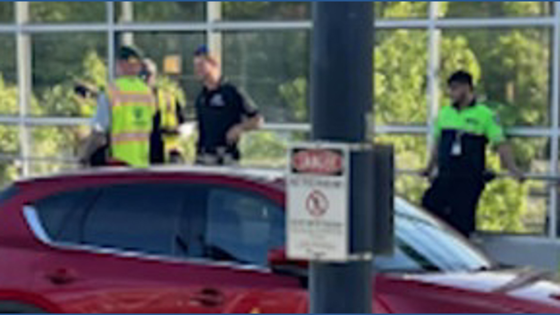 Car drives into elevated Seattle light rail station