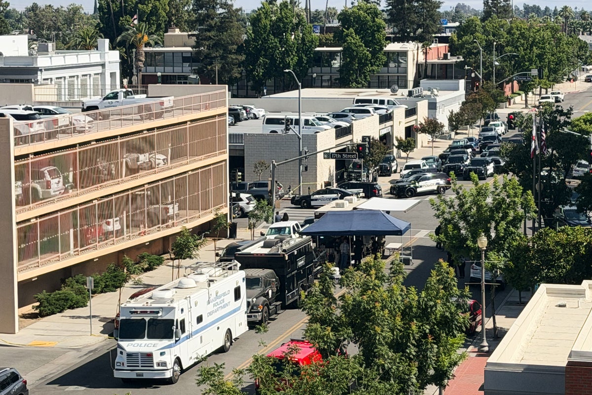 Second hostage freed as Chase Bank standoff continues - Live