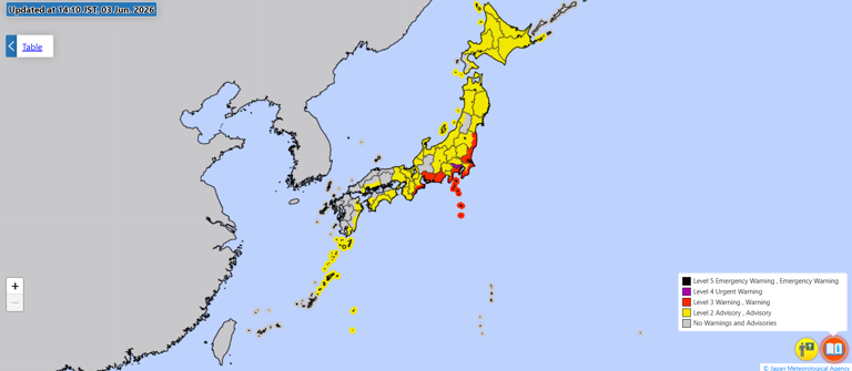Typhoon slams into Japan triggering flood warnings and travel chaos