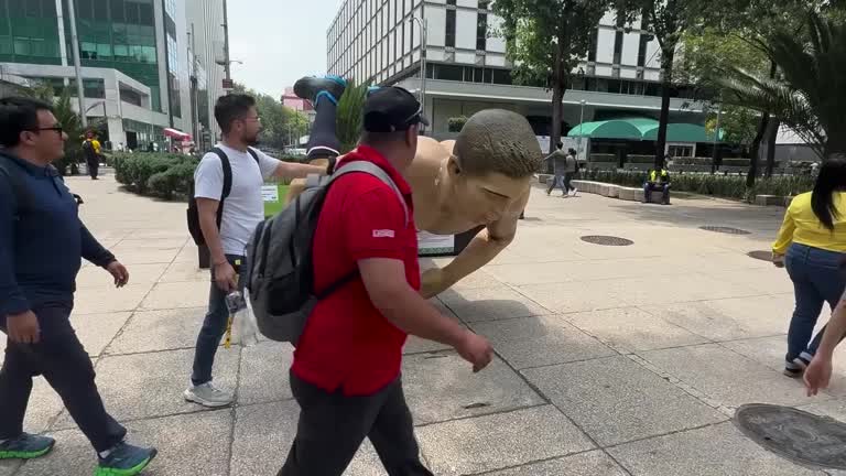 Protesters tear down World Cup statues in Mexico City