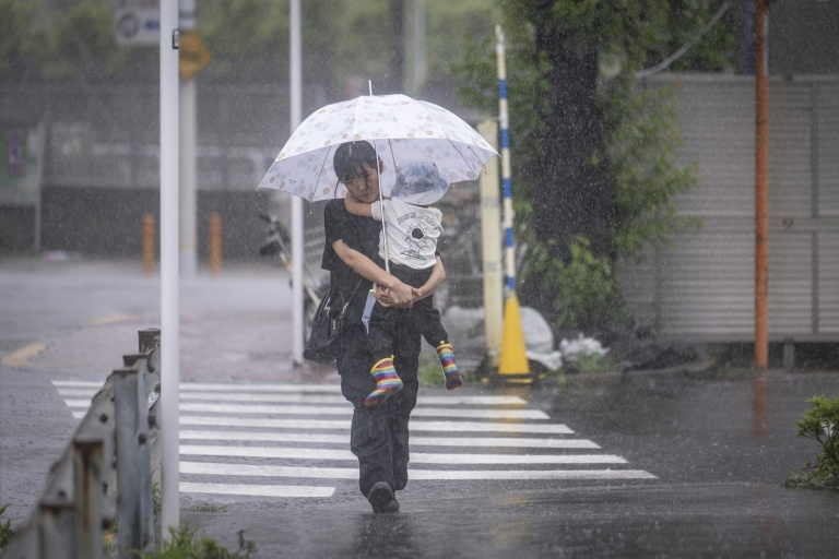 Storm Jangmi dumps torrential rain on Tokyo