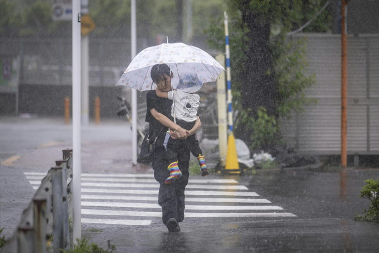 Storm Jangmi dumps torrential rain on Tokyo
