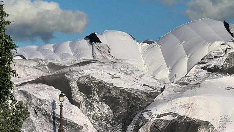 French artist JR's giant 'cave' installation in Paris appears damaged
