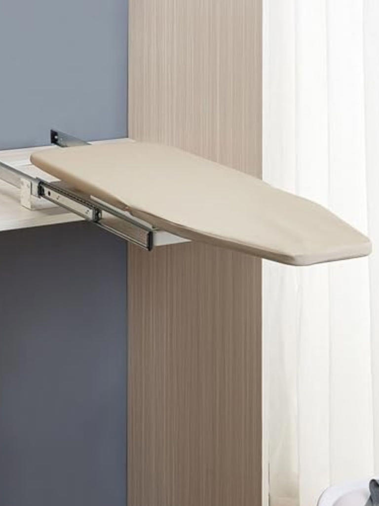 This space-saving, extending ironing board fits in a closet and gives ...