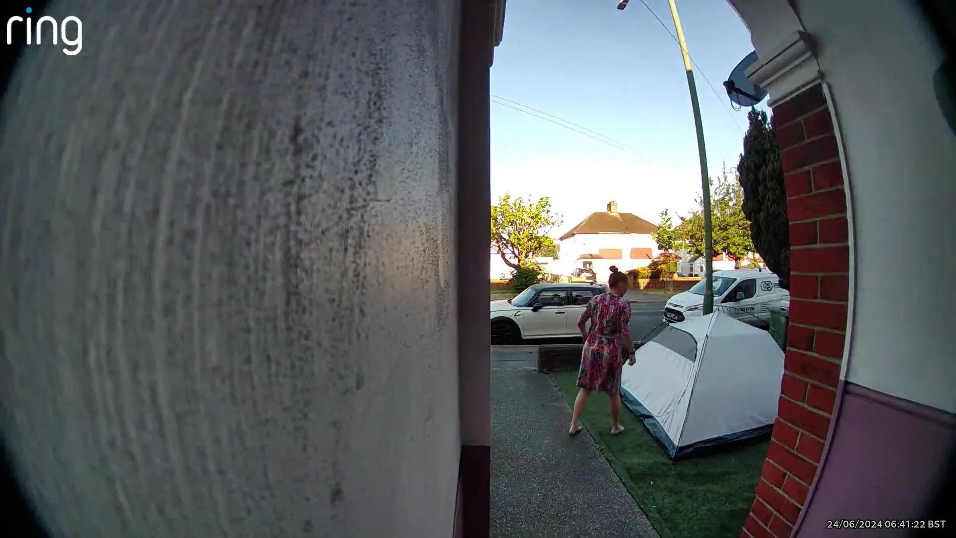 Mum wakes up to find stranger has set up tent in her front garden overnight