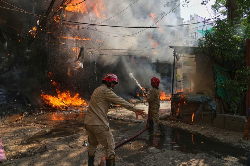 New Delhi hotel fire kills 21 people as locals pull unconscious ...
