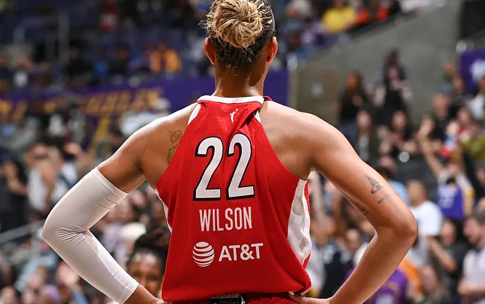 Wilson’s historic night lifts Aces over Sparks