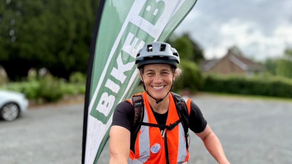 World cycling champion bikes children to school
