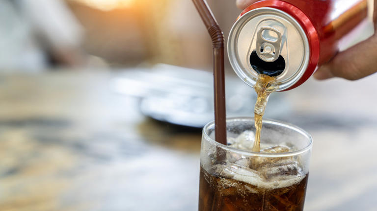 Use this trick to perfectly pour a canned soda into a glass