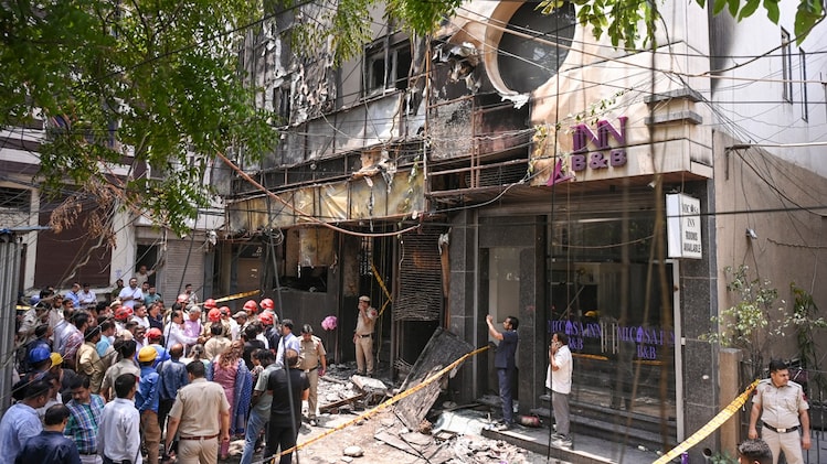 Woman with young child jumps from third floor, residents break windows ...