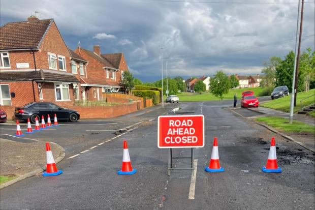 Road closed until further notice after heavy rainfall leaves surface ...