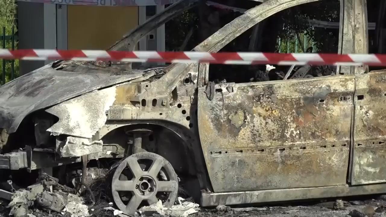 Two arrested in Italy after farm workers killed in apparent torching of car