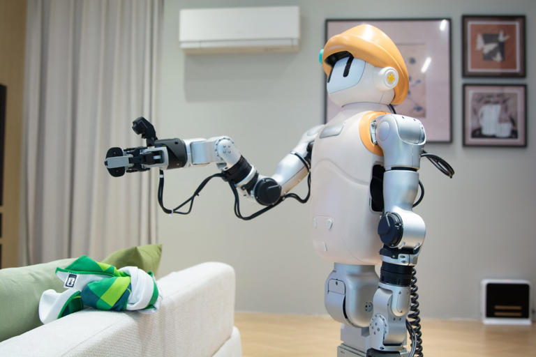 China is training a robot future — one folded shirt at a time