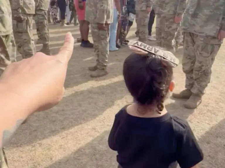 Watch: Little girl taps out soldier dad after searching through the ranks