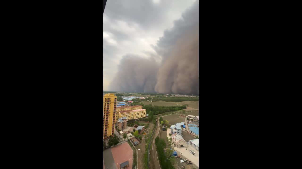 Sandstorm engulfs Harbin as 328ft dust wall damages stadium in China