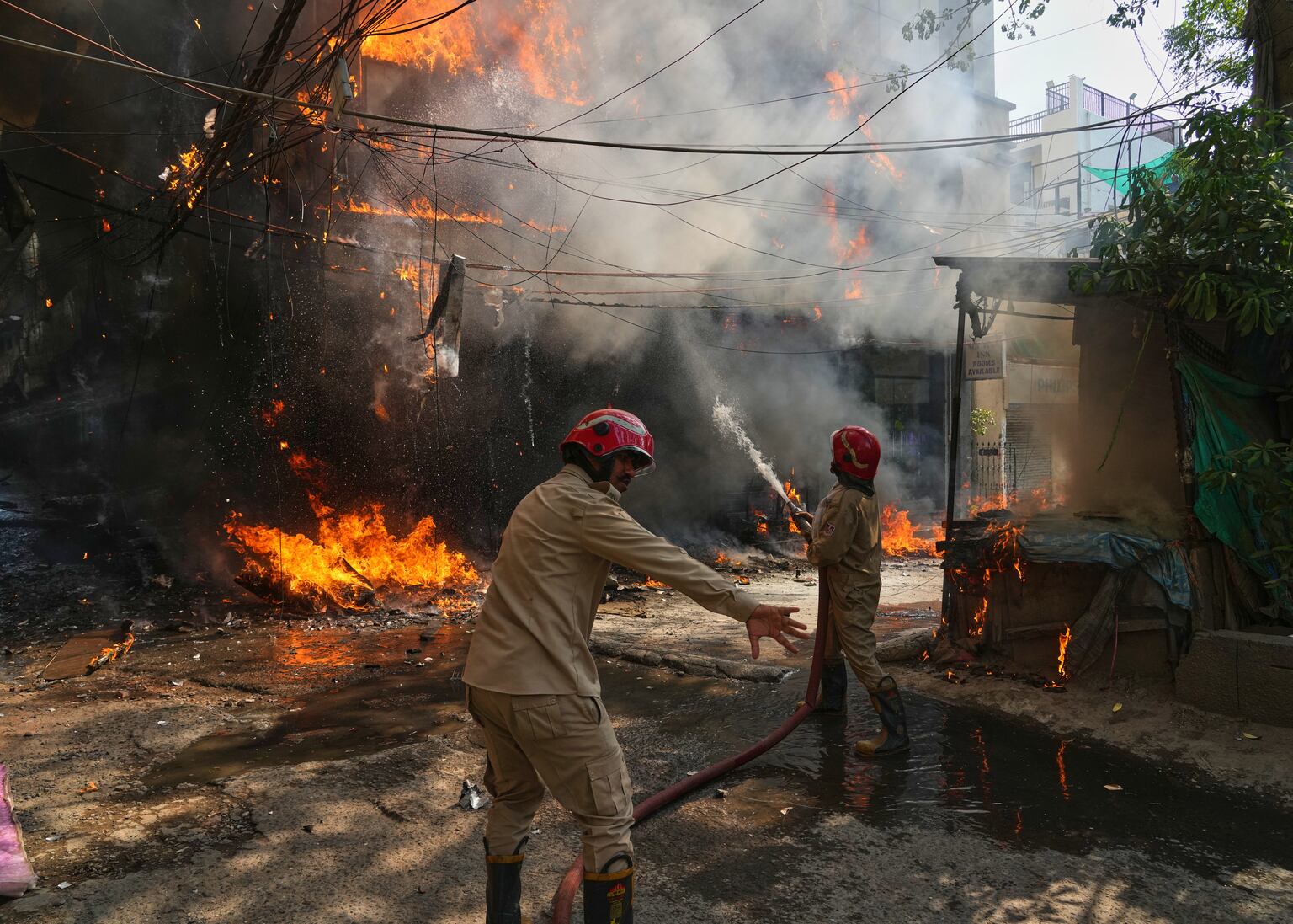 At least 21 people killed as fire sweeps through building in New Delhi