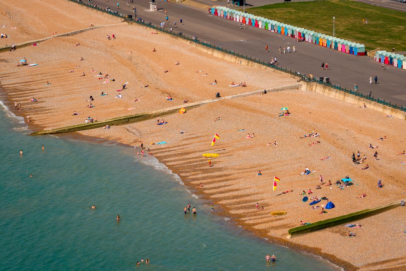 Breaking body pulled from sea at Brighton weeks after three sisters ...