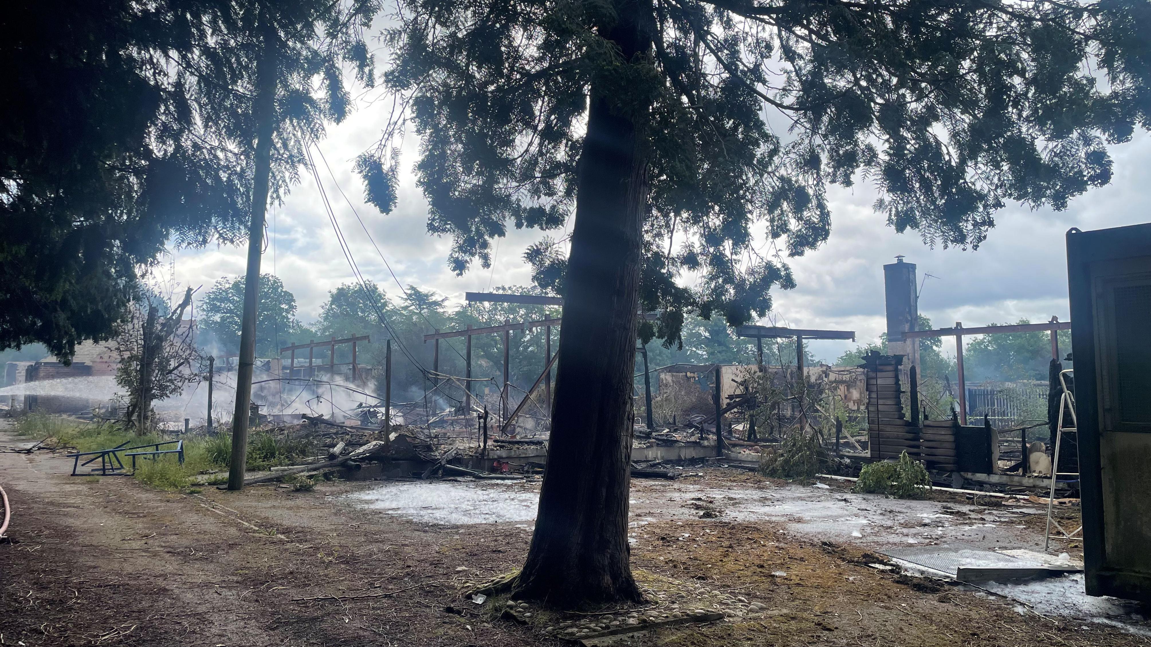 School forced to shut during college fire reopens