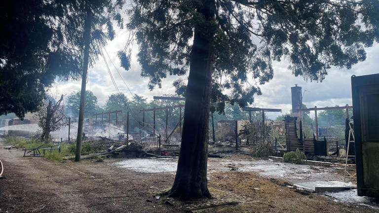 School forced to shut during college fire reopens