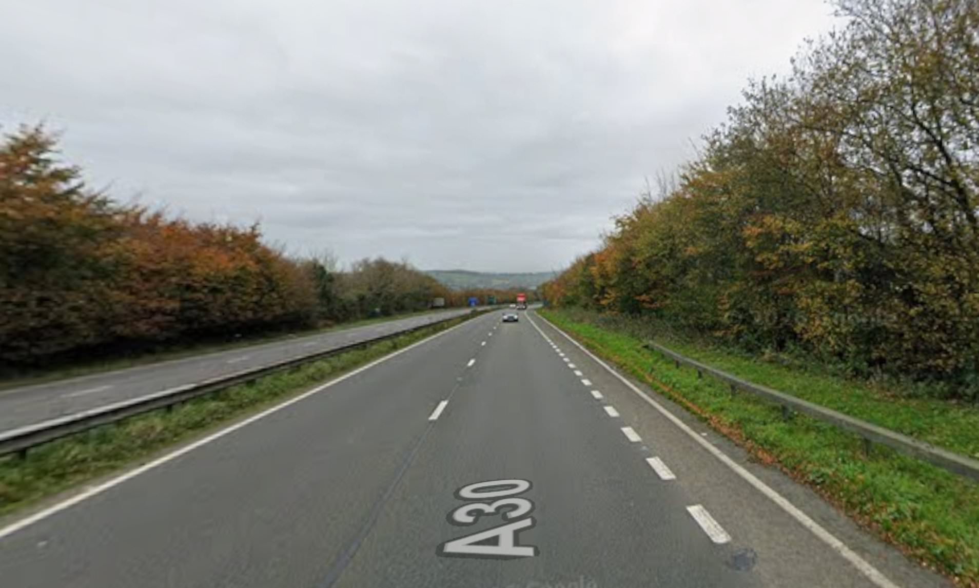 Helicopter crashes into field in Devon