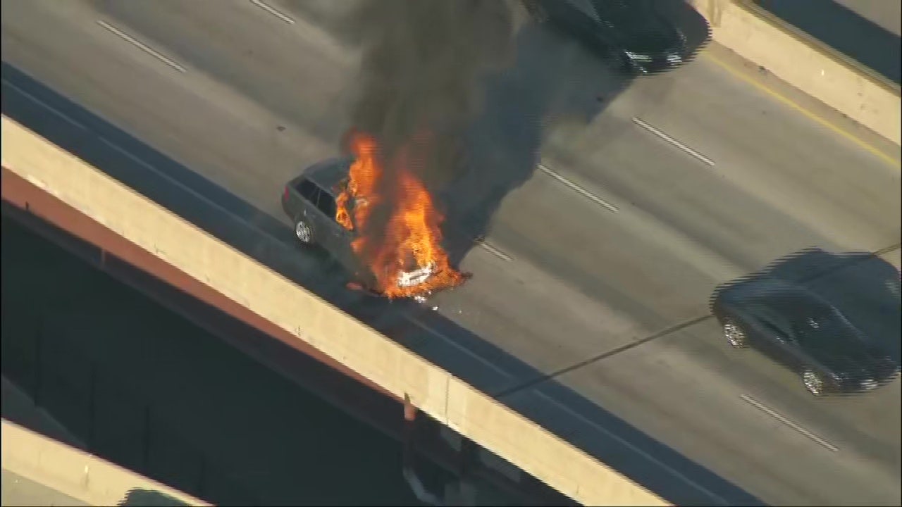SUV fully engulfed in flames on Dan Ryan Expressway during rush hour