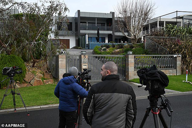 Melbourne identity Mick Gatto and his wife are arrested during raid at ...