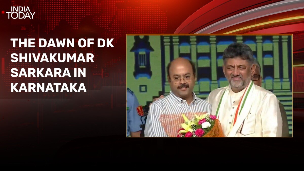 DK Shivakumar bows down before entering Vidhana Soudha, garlands ...