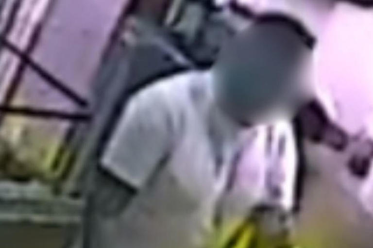 'Hide your face': CCTV captures shocking moment family runs out of ...