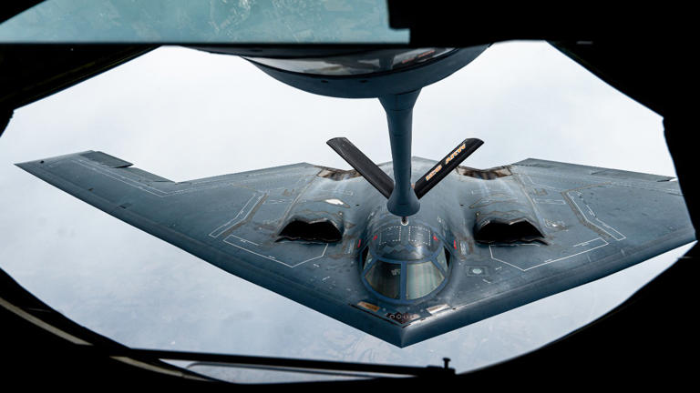 A KC-135 Stratotanker completed the first aerial refueling of a B-21 ...