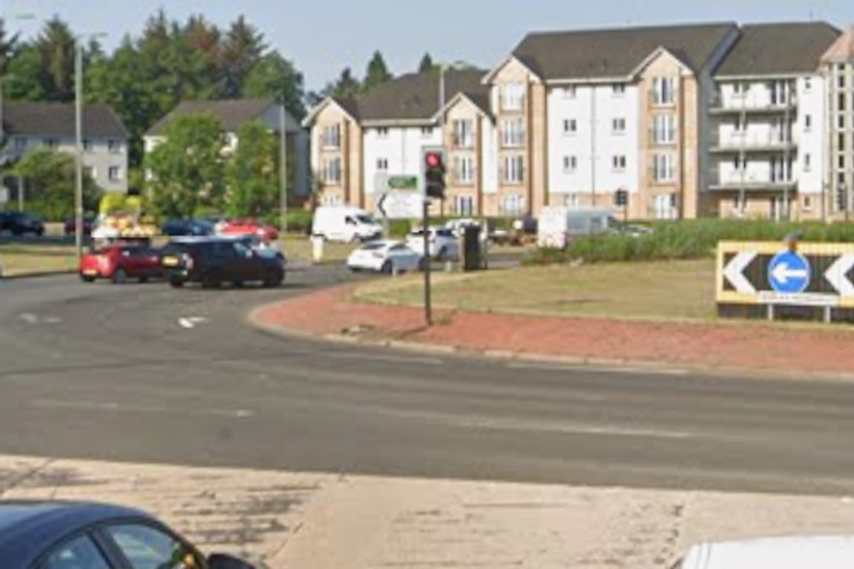 Man rushed to hospital after crash at busy East Kilbride roundabout