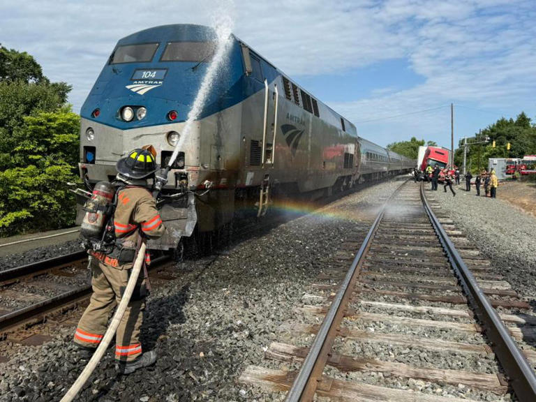 Photos: Amtrak train crashes into tractor-trailer in North Carolina