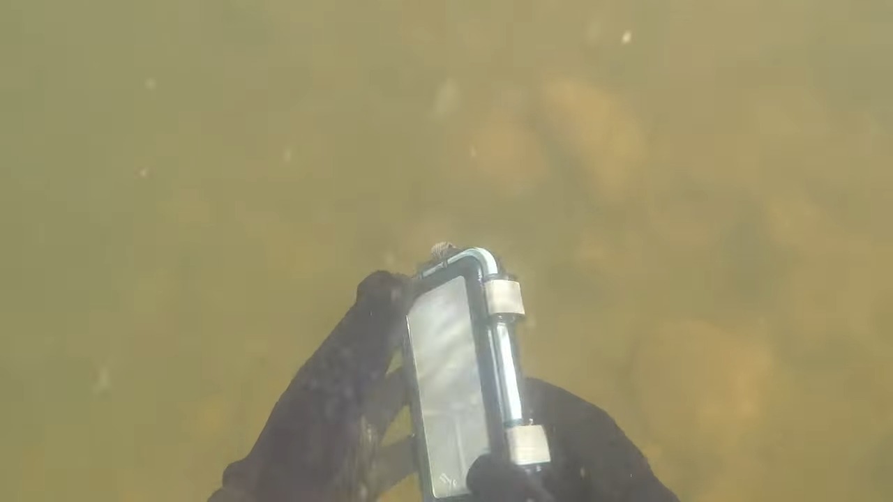 There was $52 in the box - diver finds a dry phone underwater and ...