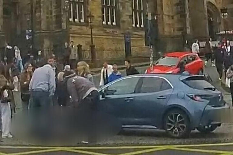 Edinburgh city centre 'collision' leaves motorcyclist 'lying on the road'