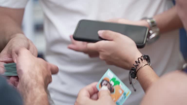Soccer fans swap 'sold out' World Cup album stickers in Madrid