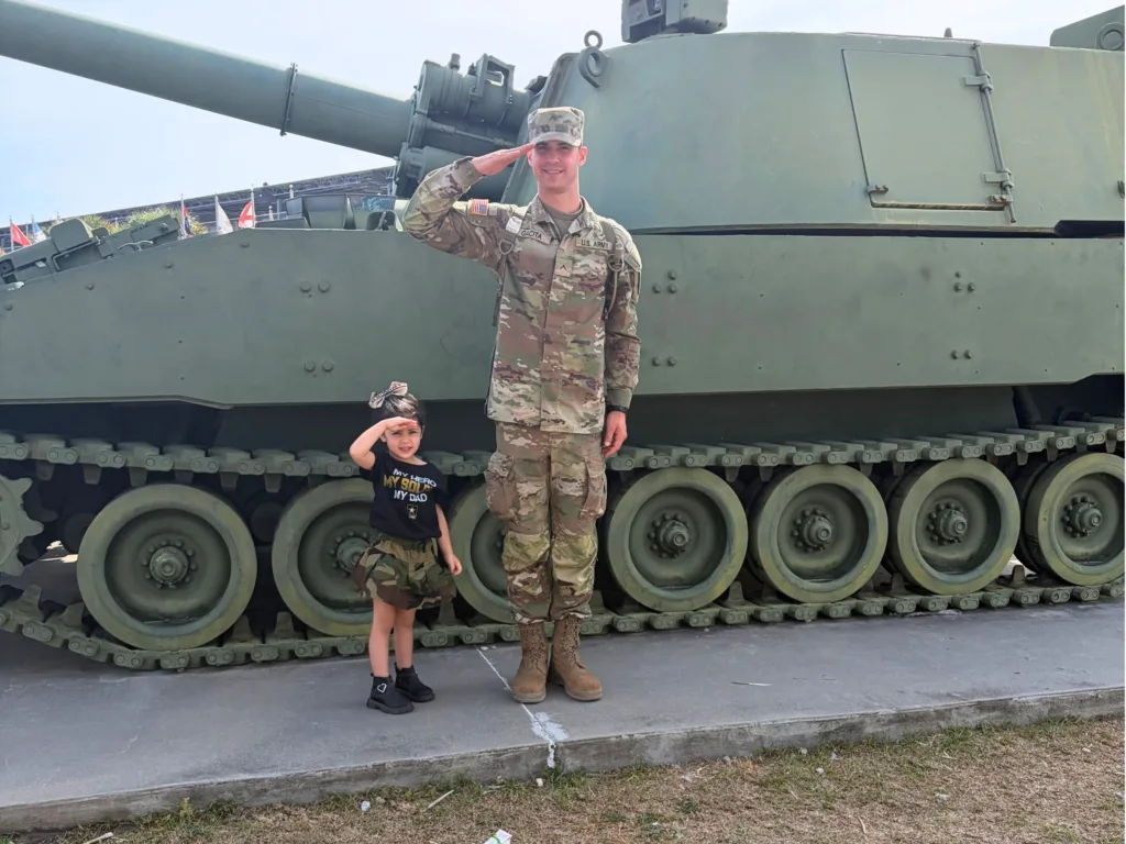 Watch: Little girl taps out soldier dad after searching through the ranks