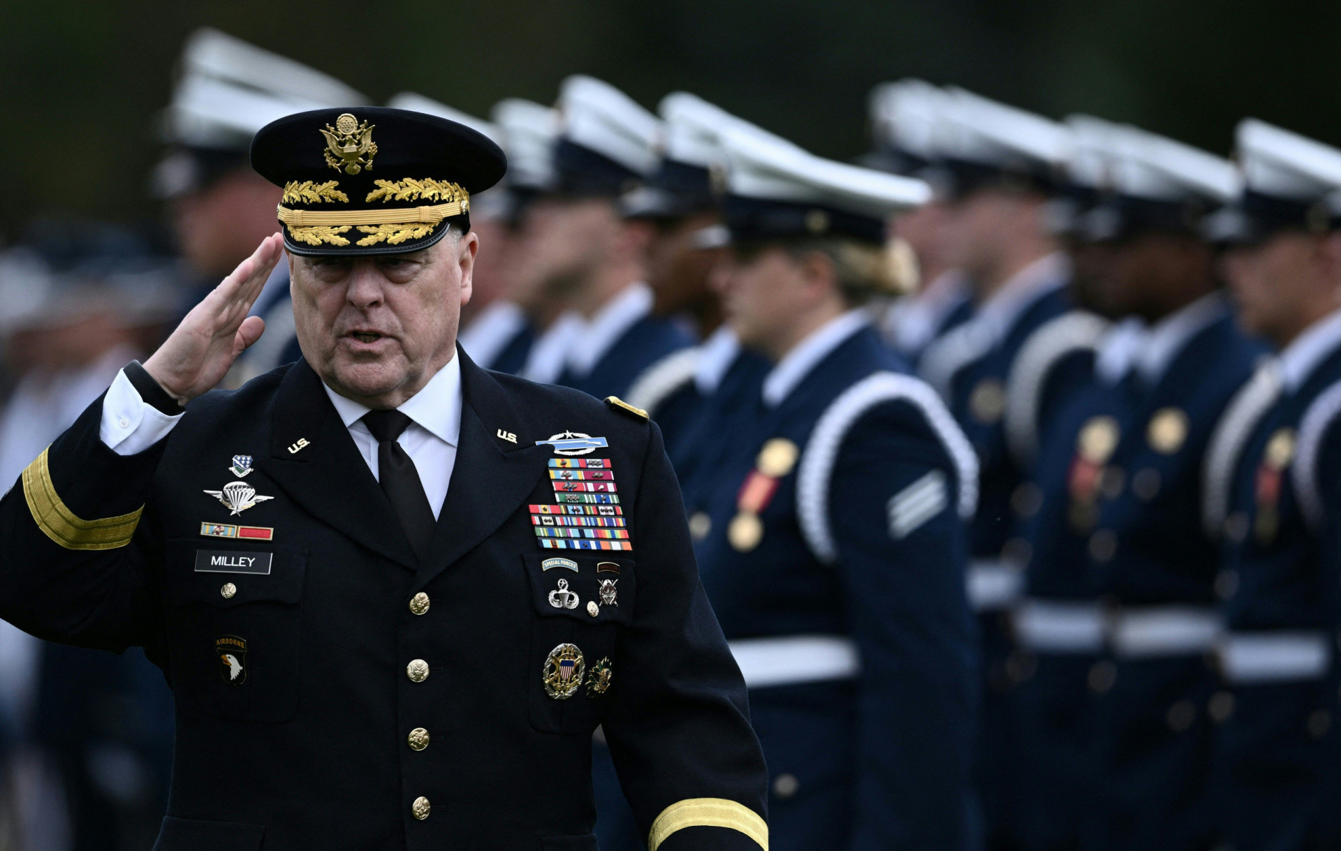 What is the meaning behind the military salute?