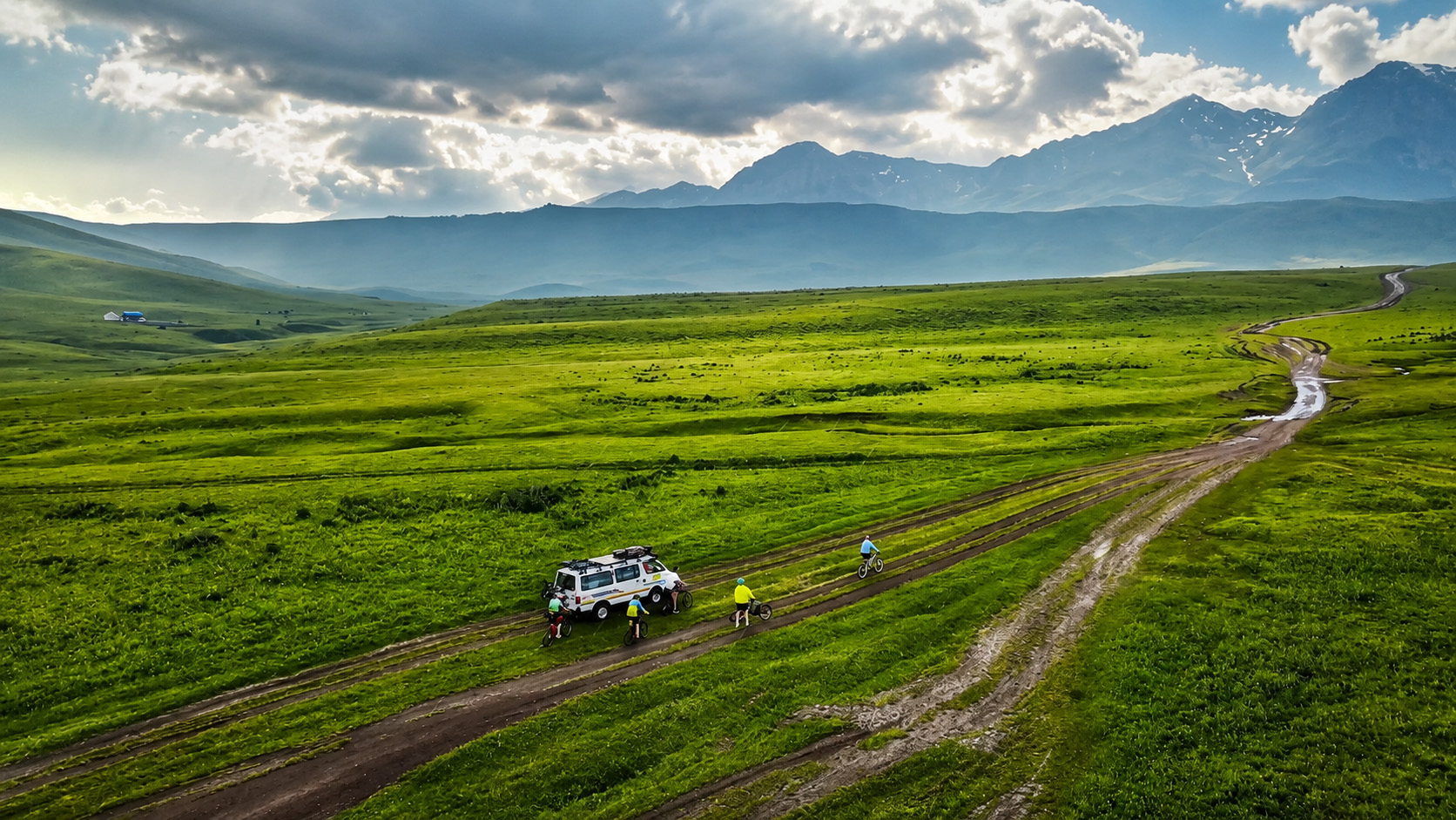 A remote Kyrgyz valley hidden beneath mountain peaks