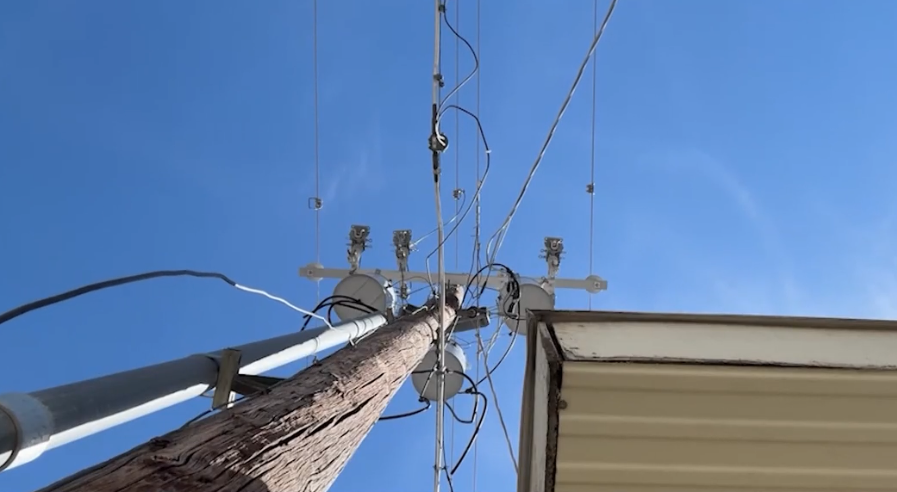 Widow says power company gave her 4 weeks to move garage or electricity ...