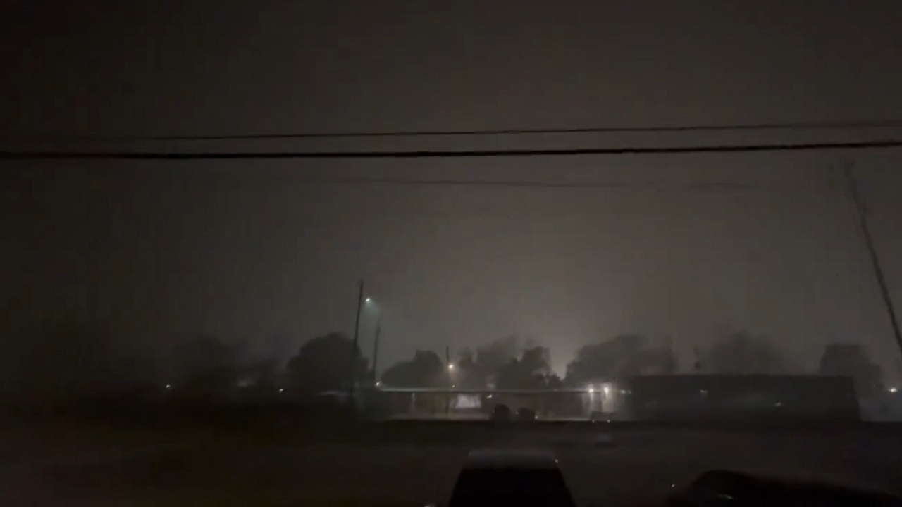 Heavy rain and pea-sized hail pummel Dayton, Texas, USA